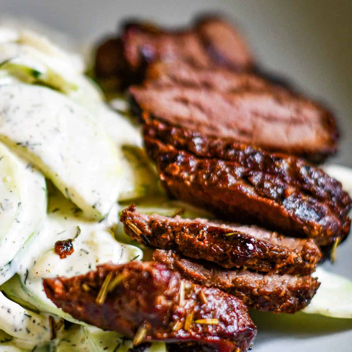 Grilled Black Bear Meat Steak with Cucumber Salad - Wild Game & Fish