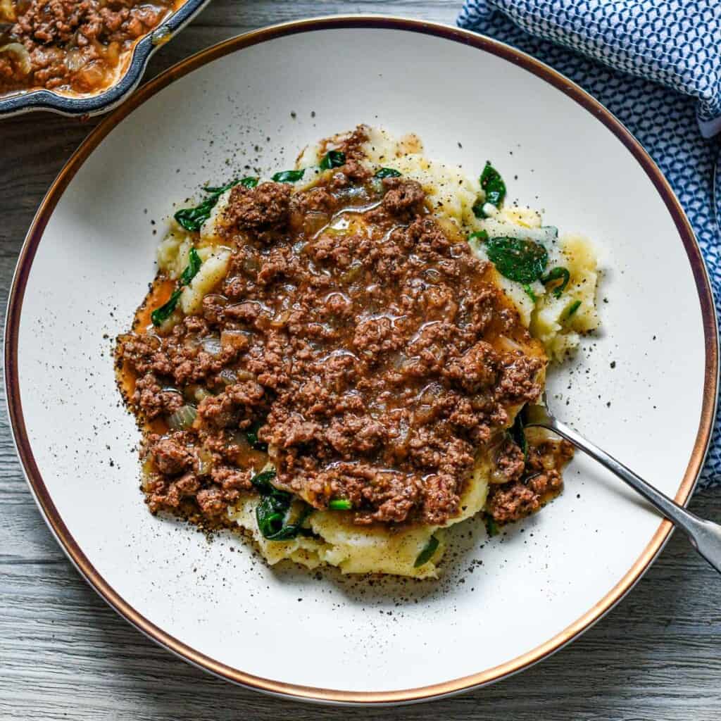 Ground Deer Meat and Gravy Over Mashed Potatoes Recipe - Wild Game & Fish