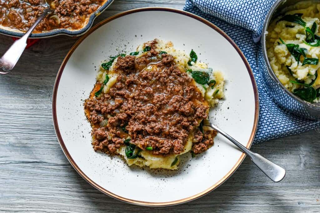Ground Deer Meat and Gravy Over Mashed Potatoes Recipe - Wild Game & Fish