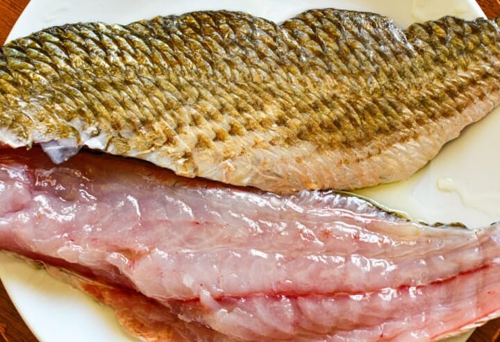 Baked Redfish on the Half Shell with Corn Maque Choux - Wild Game & Fish